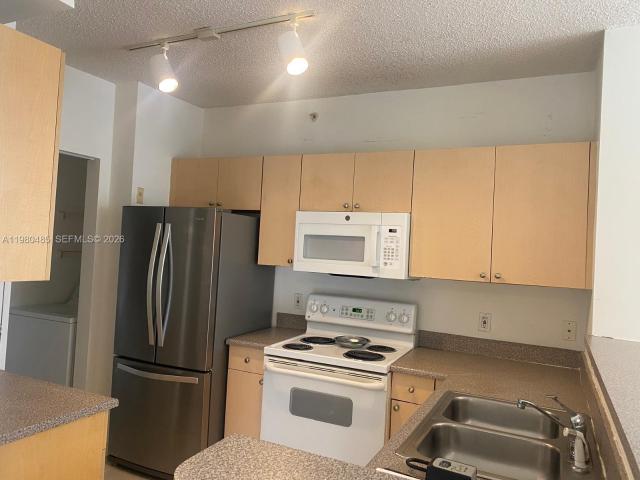 7980 N Nob Hill Rd, Unit 107, Tamarac, FL 33321 | MLS #A11980 | Compass