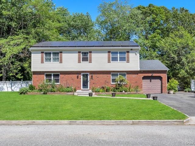83 Strathmore Village Dr, South Setauket, NY 11720