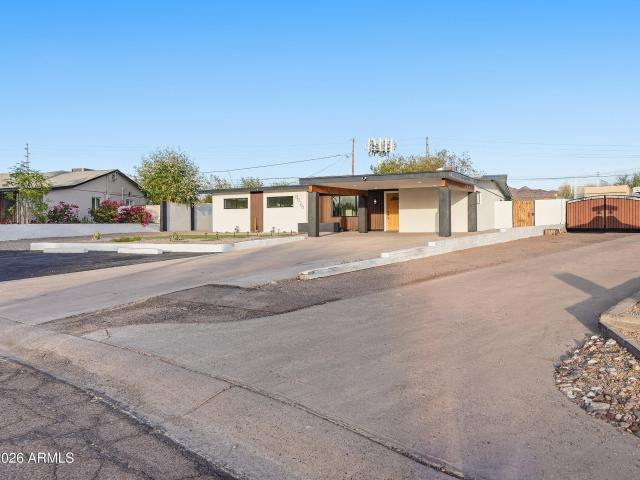 8025 N 11TH Place