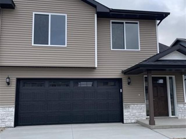 802 Armands Ln, Tiffin, IA 52340