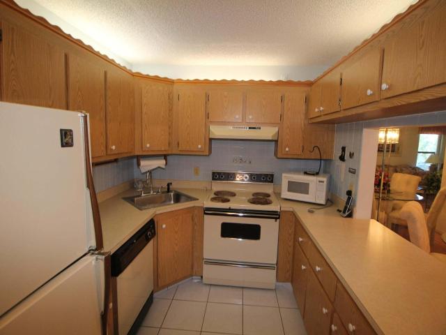 805 Sky Pine Way, Unit A2, Greenacres, FL 33415 | MLS #R11163 | Compass