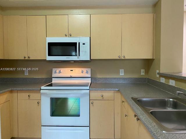 8060 N Nob Hill Rd, Unit 203, Tamarac, FL 33321 | MLS #A12003 | Compass