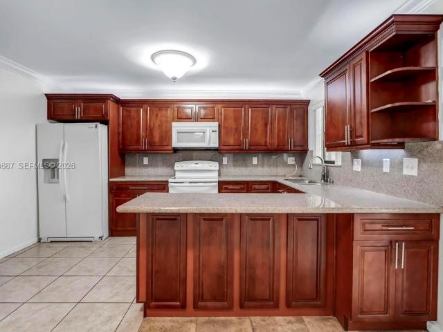 8107 SW 23rd Ct, Unit 29D, North Lauderdale, FL 33068 | MLS #A11999 | Compass