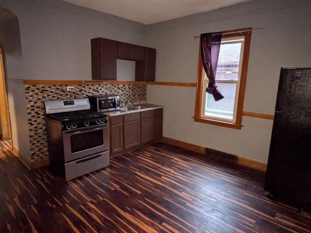 8112 S Exchange Ave, Chicago, IL 60617 | MLS #12270 | Compass