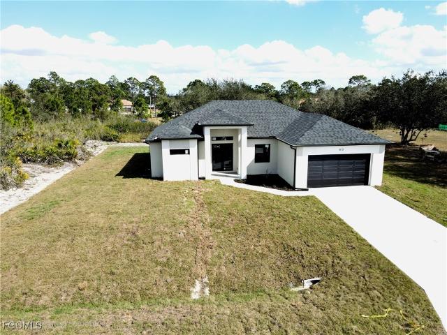 812 Hibiscus Ave, Lehigh Acres, FL 33972 | MLS #225045 | Compass