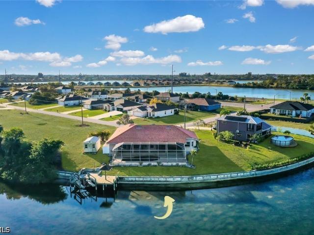 814 NW 11th Pl, Cape Coral, FL 33993 | MLS #2026015 | Compass