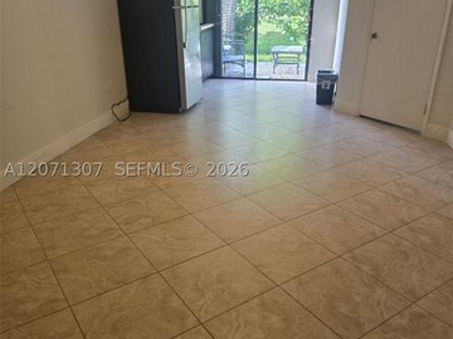 818 E Palm Run Dr, North Lauderdale, FL 33068