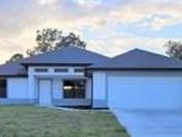 818 Leroy Ave, Lehigh Acres, FL 33972