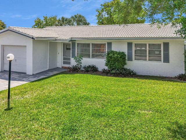 8208 NW 14th St, Plantation, FL 33322 | MLS #B26007 | Compass