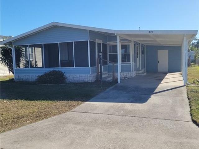 821 Lychee Dr, Barefoot Bay, FL 32976