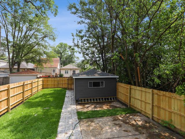 8235 S Woodlawn Ave, Chicago, IL 60619 | MLS #12626 | Compass