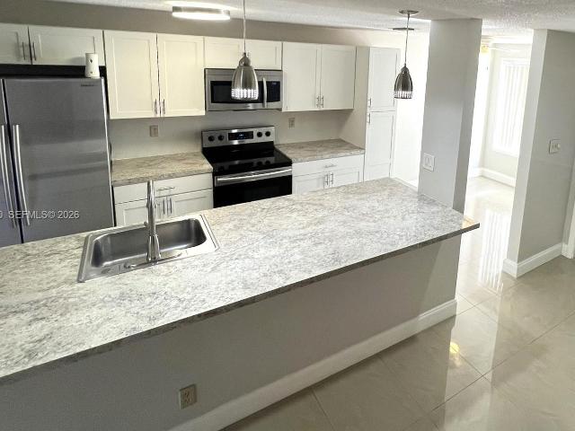 8249 NW 8th Pl, Unit 4, Plantation, FL 33324 | MLS #A11982 | Compass