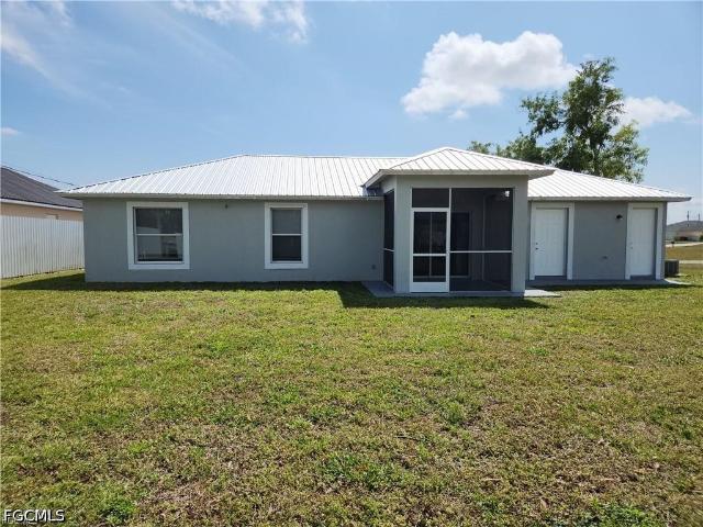 827 NE 23rd Ter, Cape Coral, FL 33909 | MLS #2026018