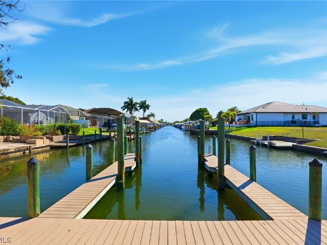 828 SW 52nd St, Cape Coral, FL 33914 | MLS #2026009 | Compass