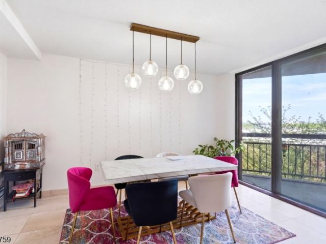 831 Harmon Cove Tower