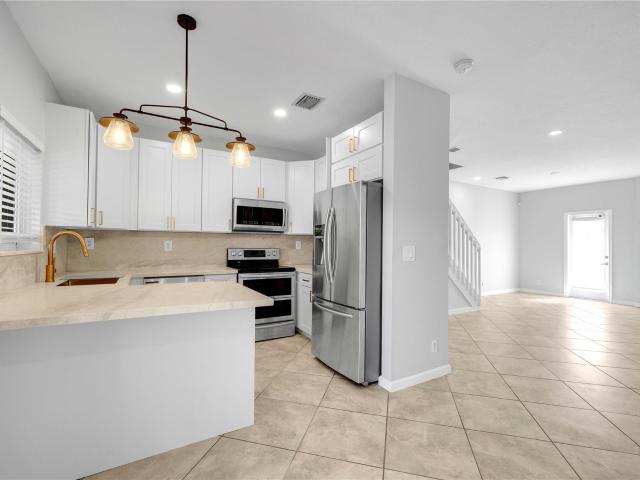 8464 Lagos De Campo Blvd, Tamarac, FL 33321 | MLS #F10537 | Compass