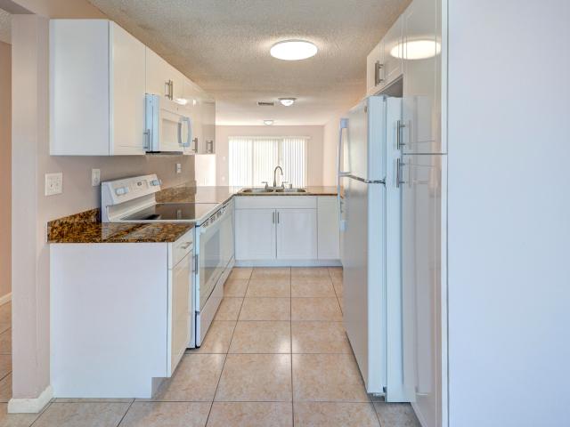 858 Crystal Lake Dr, Deerfield Beach, FL 33064 | MLS #B26009 | Compass