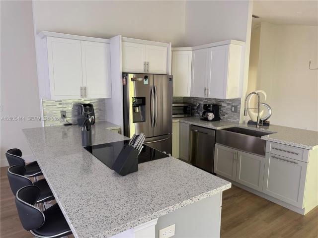 8611 NW 51st Ct, Lauderhill, FL 33351 | MLS #A12005 | Compass