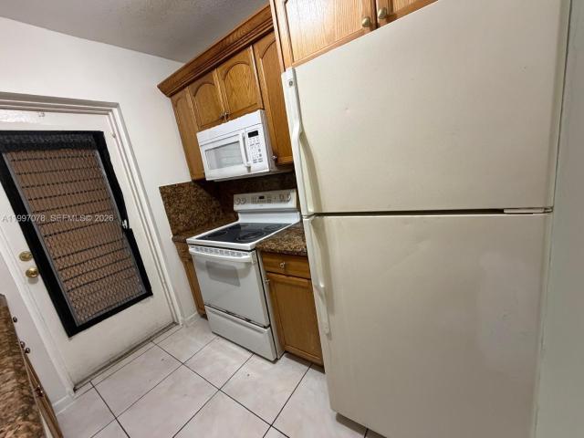 8704 NW 35th St, Unit 208, Coral Springs, FL 33065 | MLS #A11997