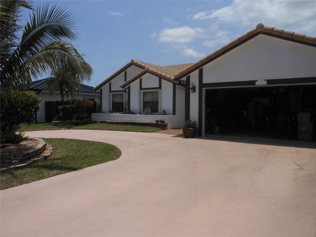 8706 NW 83rd St, Tamarac, FL 33321 | MLS #F10508 | Compass
