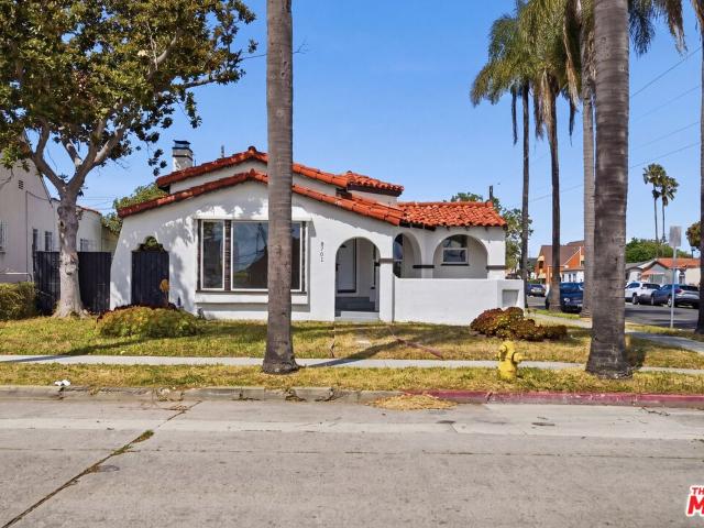 8701 S Denker Ave, Los Angeles, CA 90047 | MLS #26795 | Compass