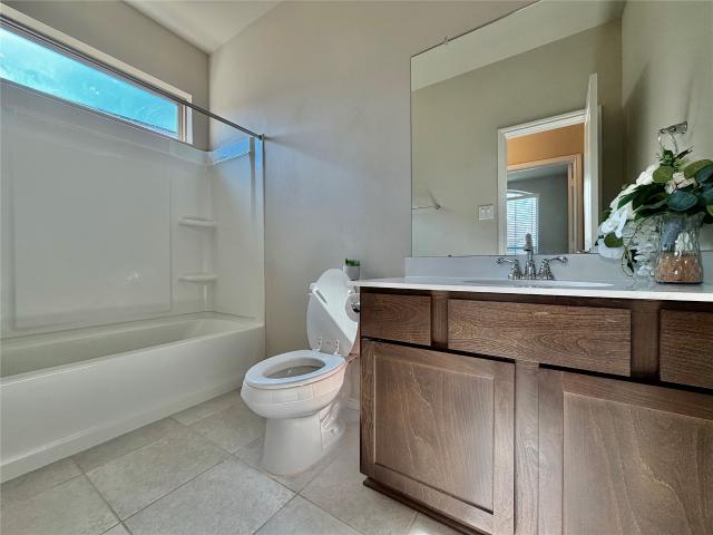 8711 Windsong Trail Drive