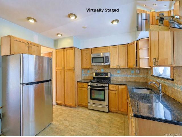 877 E 223rd Street