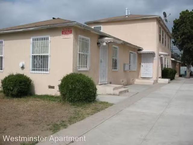 8806 1/2 Orchard Avenue 8804 Orchard Avenue
