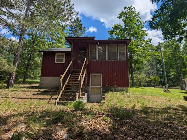 8872 Echo Valley Trl, Atlanta, MI 49709