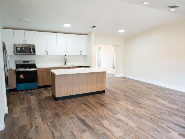 8915 NW 26th Ct, Coral Springs, FL 33065 | MLS #A11983 | Compass