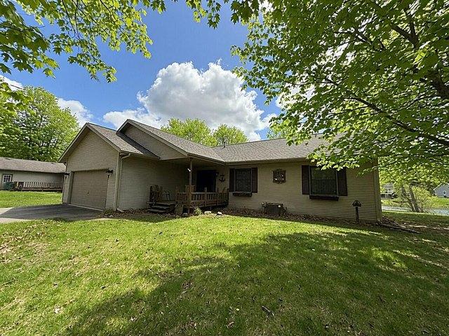 8917 Longview Dr, Canadian Lakes, MI 49346