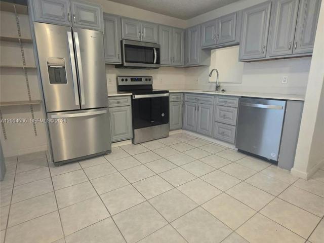 8958 W Sample Rd, Unit 8958, Coral Springs, FL 33065 | MLS #A12004