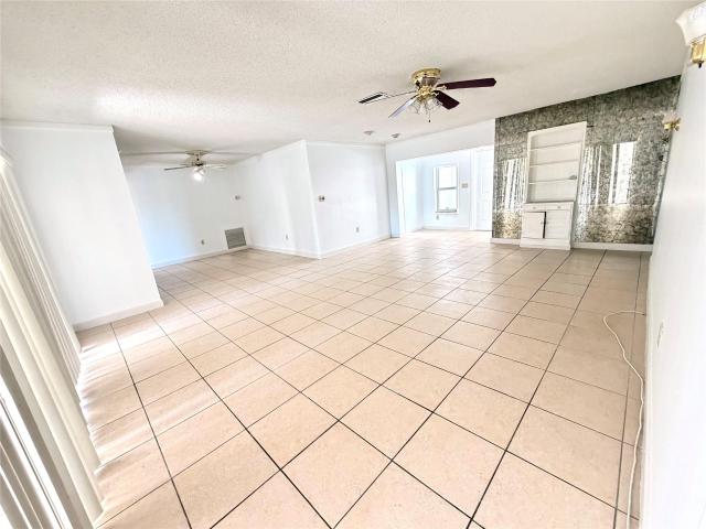 8980 NW 24th Pl, Sunrise, FL 33322 | MLS #F10552 | Compass