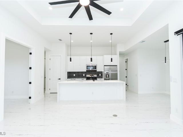 903 NE 23rd St, Cape Coral, FL 33909 | MLS #2025018 | Compass