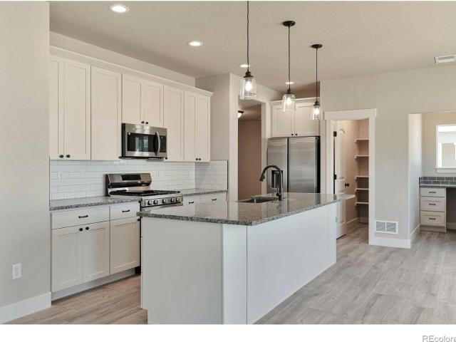 9050 Harlequin Circle