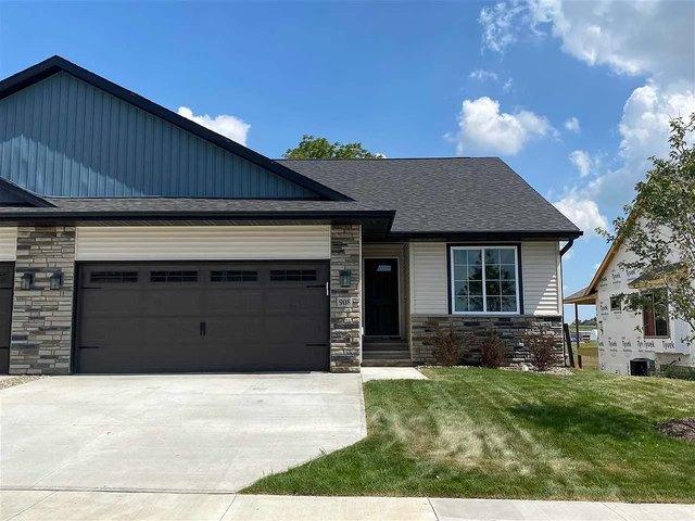 908 Creekside Dr, Tiffin, IA 52340