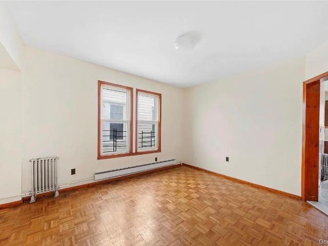 90 37 77th Street