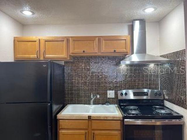 9105 W Hillsborough Ave, Unit I104, Tampa, FL 33615 | MLS #TB8486