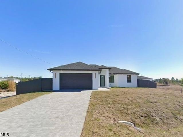 913 Mildred Ave S, Lehigh Acres, FL 33974