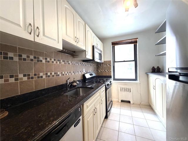 91 08 32 Avenue E107
