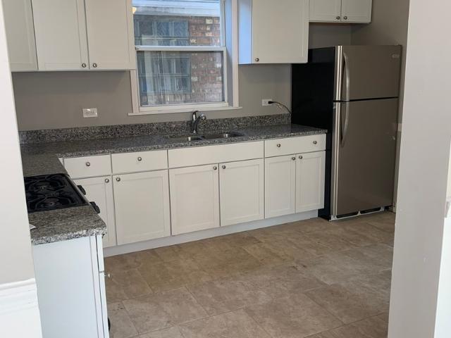 9211 S Clyde Ave, Chicago, IL 60617 | MLS #12546 | Compass