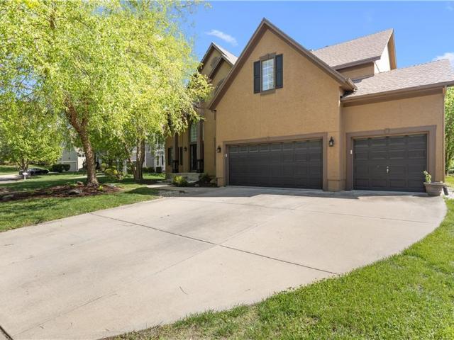 9233 W 143rd Ter, Overland Park, KS 66221 | MLS #2608 | Compass
