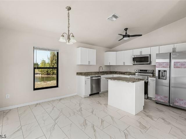 923 NE 1st Ave, Cape Coral, FL 33909 | MLS #2026015