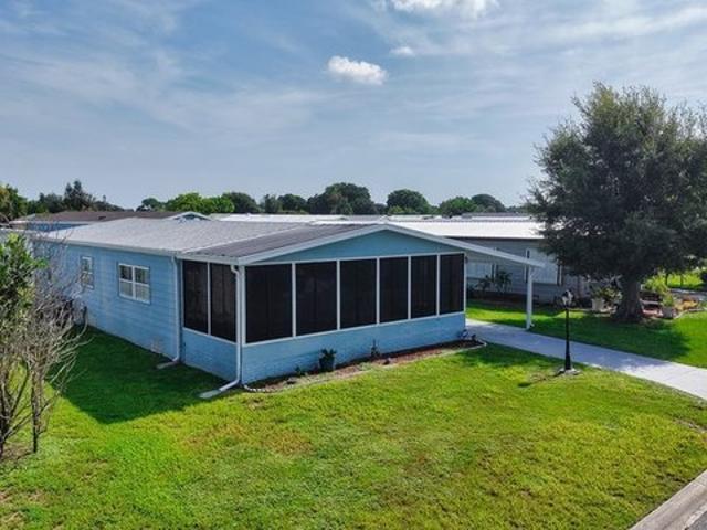 926 Frangi Pani Dr, Barefoot Bay, FL 32976