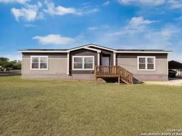 930 COUNTY ROAD 5710, DEVINE, TX 78016 Single Family Residence.