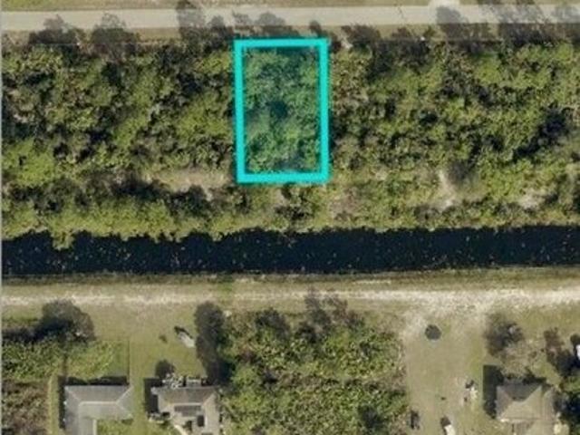 930 Kanuga St E, Lehigh Acres, FL 33974