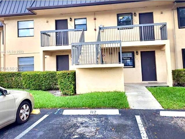9317 NW 1st Ct, Unit 105, Pembroke Pines, FL 33024 | MLS #A11860 | Compass