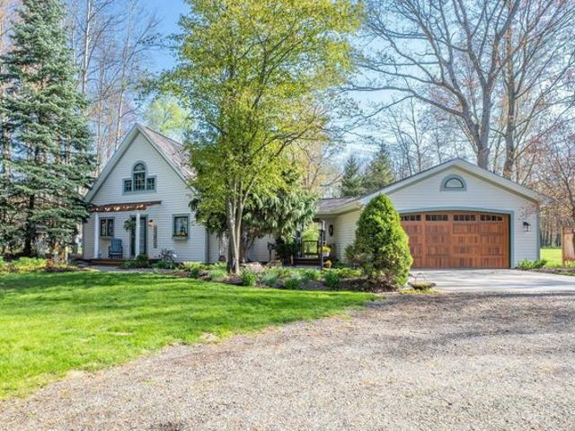 9362 Club House Dr W, Canadian Lakes, MI 49346