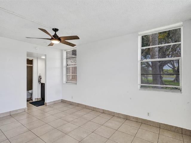 9440 Poinciana Pl, Unit 101, Davie, FL 33324 | MLS #B26015