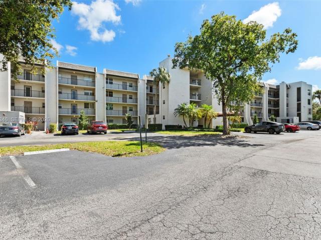 9480 Poinciana Pl, Unit 407, Davie, FL 33324 | MLS #A11977 | Compass